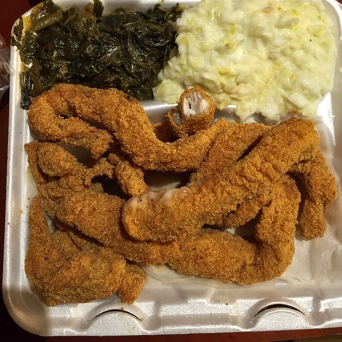 This isn't just fried catfish – it's edible art. Perfectly seasoned, expertly fried, and served alongside classic sides that complete this soul-satisfying masterpiece.