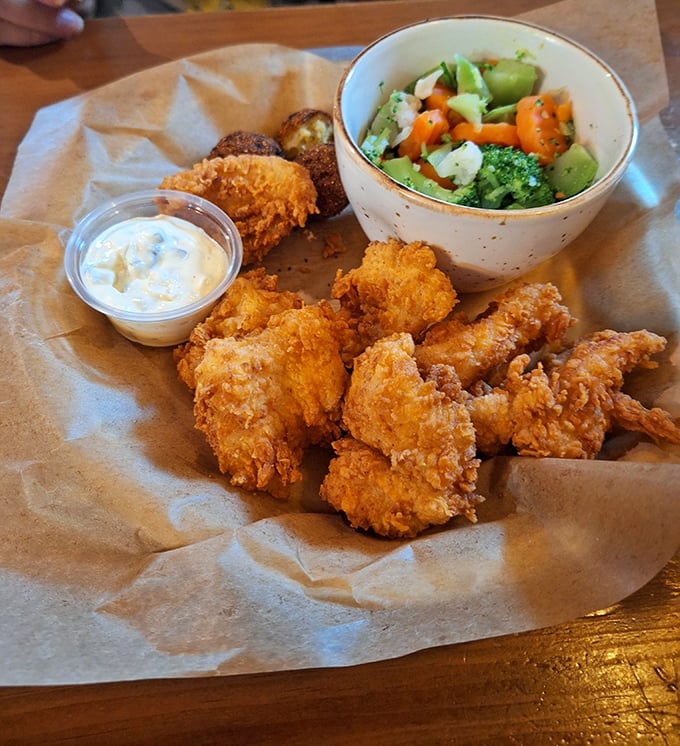 Golden-fried perfection meets fresh vegetables—proof that balance in life is possible, even when one side is deliciously battered and crispy.