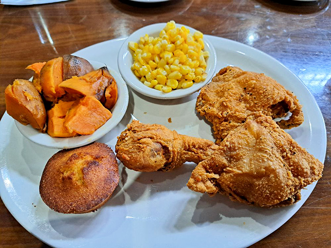 This fried chicken plate looks like what happens when comfort food goes to finishing school – refined but authentic.