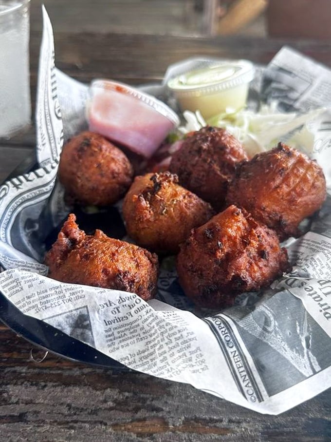 These conch fritters aren't just appetizers—they're edible Florida history, golden-fried and served with a side of Keys authenticity.