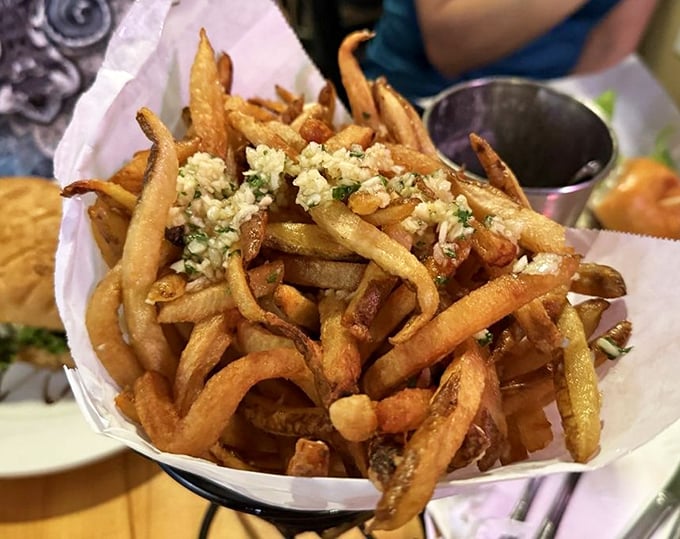 These aren't just fries—they're potato sticks that went to finishing school and graduated with honors in garlic and herbs.
