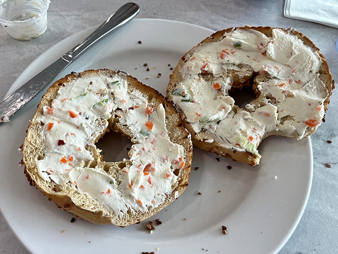The humble bagel, transformed by vegetable cream cheese into a canvas of morning possibilities. Breakfast art at its finest.