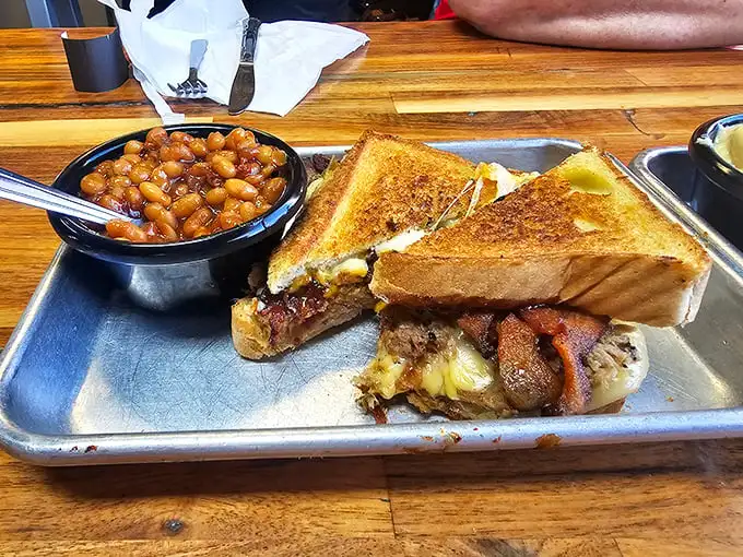 Not your childhood grilled cheese—this sandwich has grown up, gone to college, and come back with pulled pork and attitude.