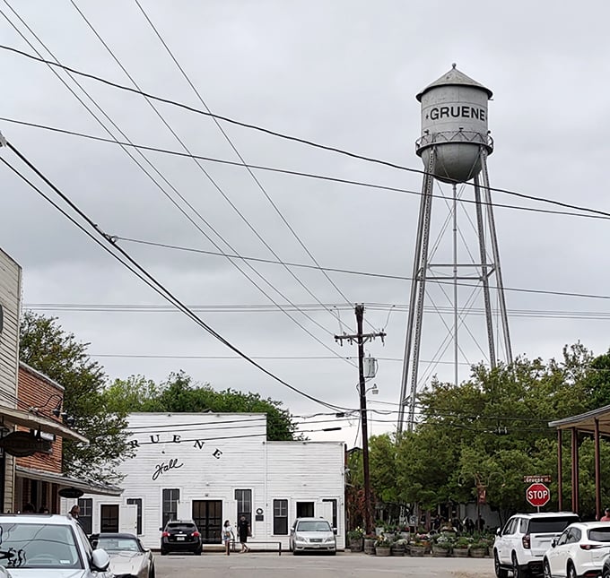 That water tower watching over Gruene Hall has witnessed more dance moves and bad decisions than any structure rightfully should.