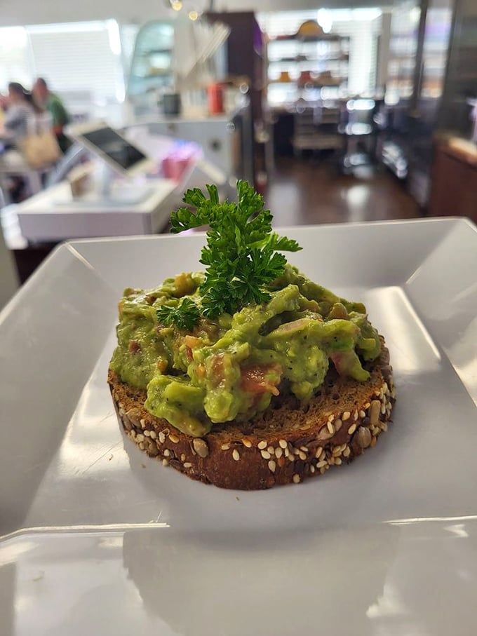 Avocado toast that doesn't require a second mortgage—just honest-to-goodness green goodness on hearty seeded bread that would make your cardiologist smile.
