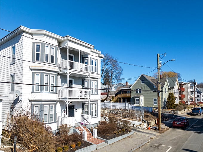 Classic New England triple-deckers offer affordable housing with character to spare. These aren't cookie-cutter condos – they're homes with stories.