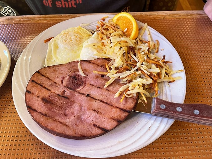 Sometimes the simplest pleasures – ham, eggs, and crispy hash browns – are the most satisfying.
