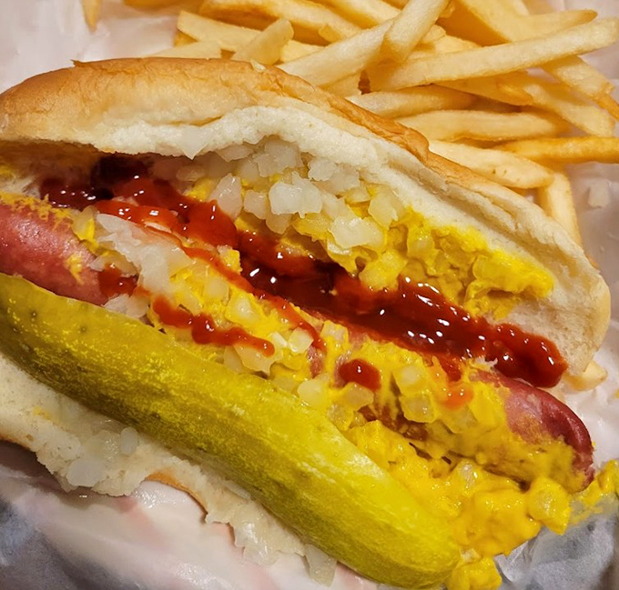 Chicago's idea of a proper hot dog—dressed to impress with mustard, onions, relish, and pickle. Ketchup? That's a conversation you don't want to start here.