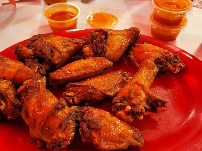 These wings aren't just hot—they're ready for their close-up. The glistening sauce promises a flavor explosion that requires extra napkins.