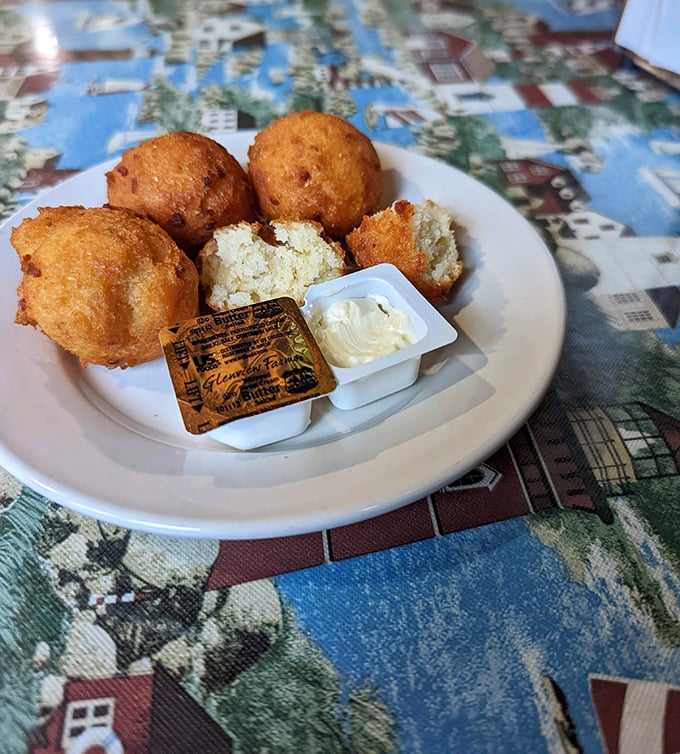 Golden-brown hushpuppies that crunch then yield to a tender interior. These aren't just side dishes—they're little spheres of Southern comfort.