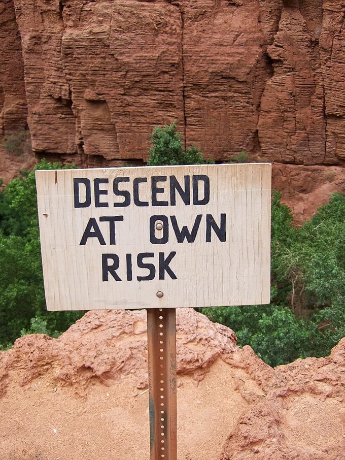 That "Descend at Own Risk" sign isn't kidding – this is where adventure separates from vacation.