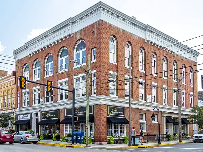 This vibrant storefront with its "Worth the walk" banner and colorful balloon display is Bedford's way of saying "Yes, we do fun here too!"