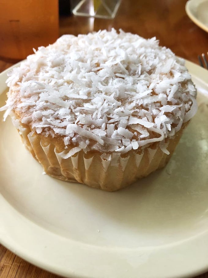 The Key Lime Coconut Muffin – where tropical flavors meet bakery magic, creating what might be the perfect souvenir for your drive home (if it lasts that long).