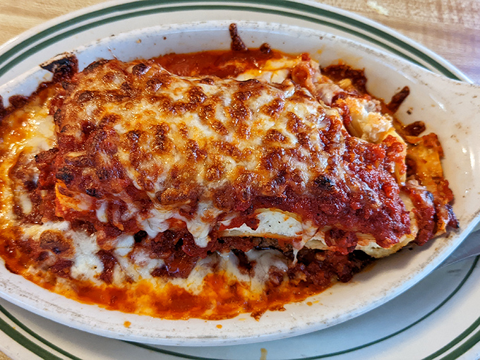 Lasagna that doesn't just sit on the plate—it commands attention with layers of pasta, cheese, and sauce in perfect harmony.