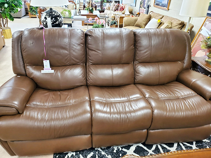 This leather sofa hasn't just been gently used—it's been properly introduced to the art of relaxation and is ready to continue its legacy.
