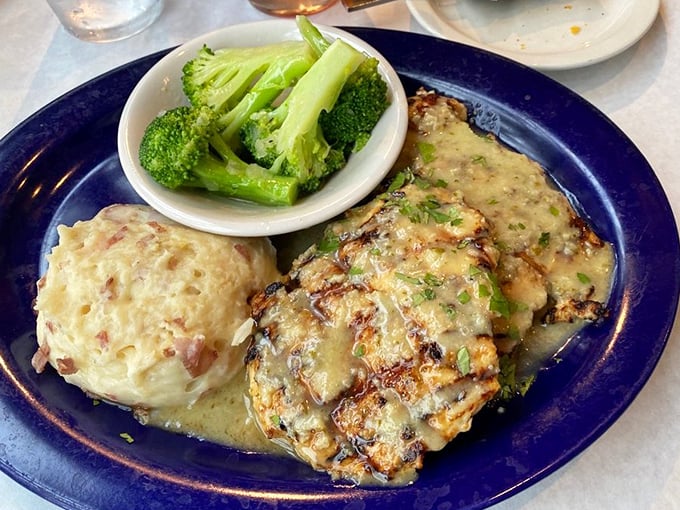 Succulent chicken bathed in a bright sauce with perfectly cooked vegetables – a plate that makes eating your greens feel like a reward.