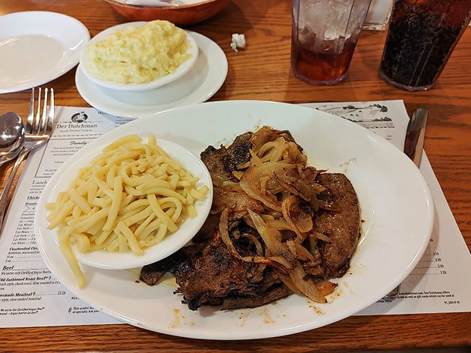 A classic liver and onions plate with buttery noodles that would make your grandmother nod in approval—hearty Midwestern fare that feeds both body and nostalgia.