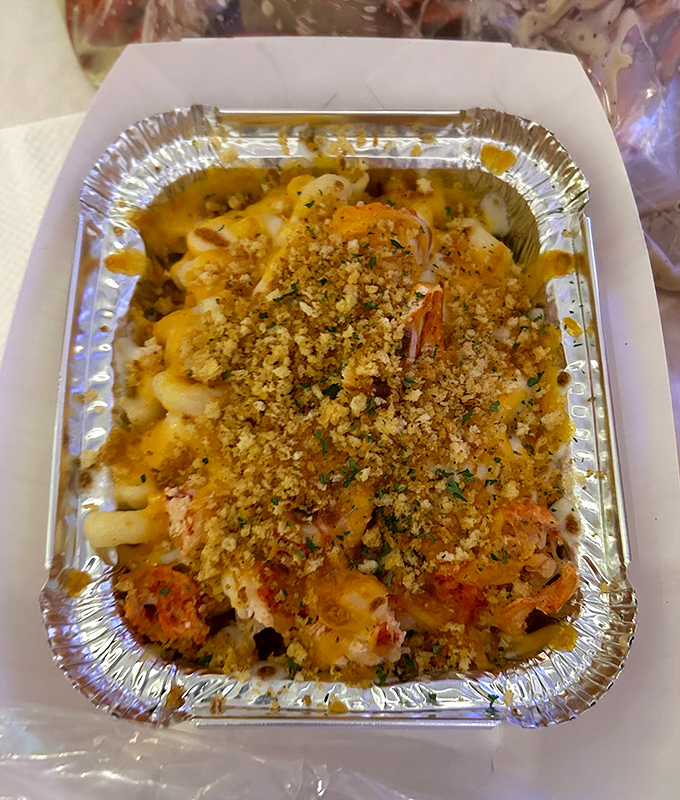 This isn't just mac and cheese—it's a creamy, crusty, seafood-studded masterpiece that would make your grandmother both jealous and proud.