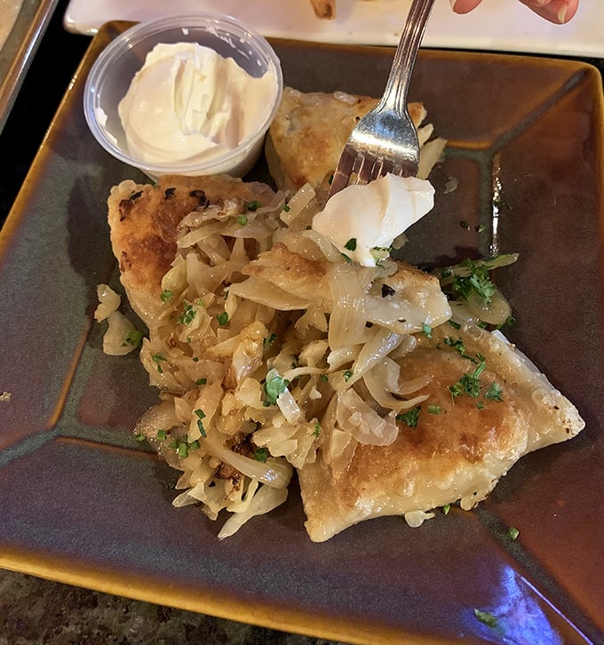 These aren't your grandmother's pierogies—unless your grandmother was a culinary genius who topped them with caramelized onions.