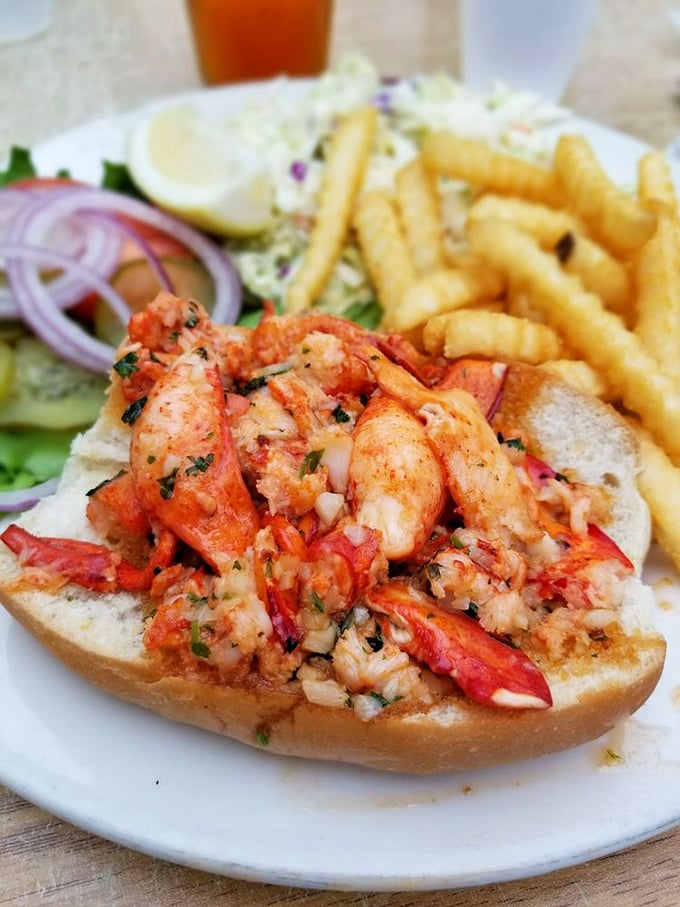 This lobster roll isn't just a sandwich – it's a summer romance between sweet crustacean and buttery bread that you'll never forget.