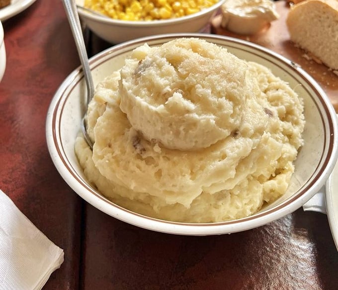These mashed potatoes aren't whipped into submission—they're lovingly persuaded into creamy perfection with butter as the negotiator.