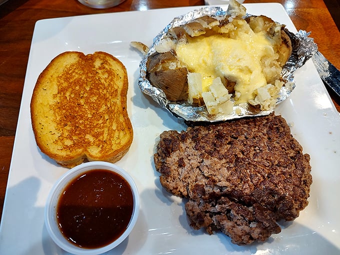 The ultimate comfort plate – a hearty meatloaf with loaded potato that whispers, "Diet? What diet? We're having a moment here."