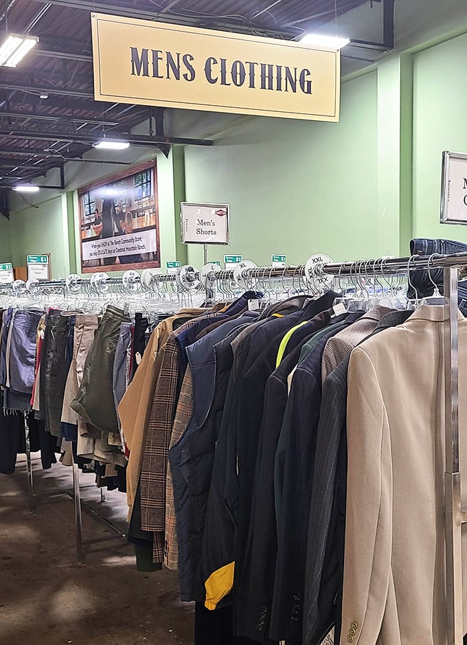 Men's clothing racks stretch into the distance like a sartorial runway of second chances and excellent deals.