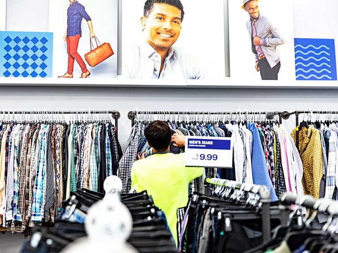Signs overhead promise organization in a world of beautiful retail chaos. Even in an outlet, some order prevails.