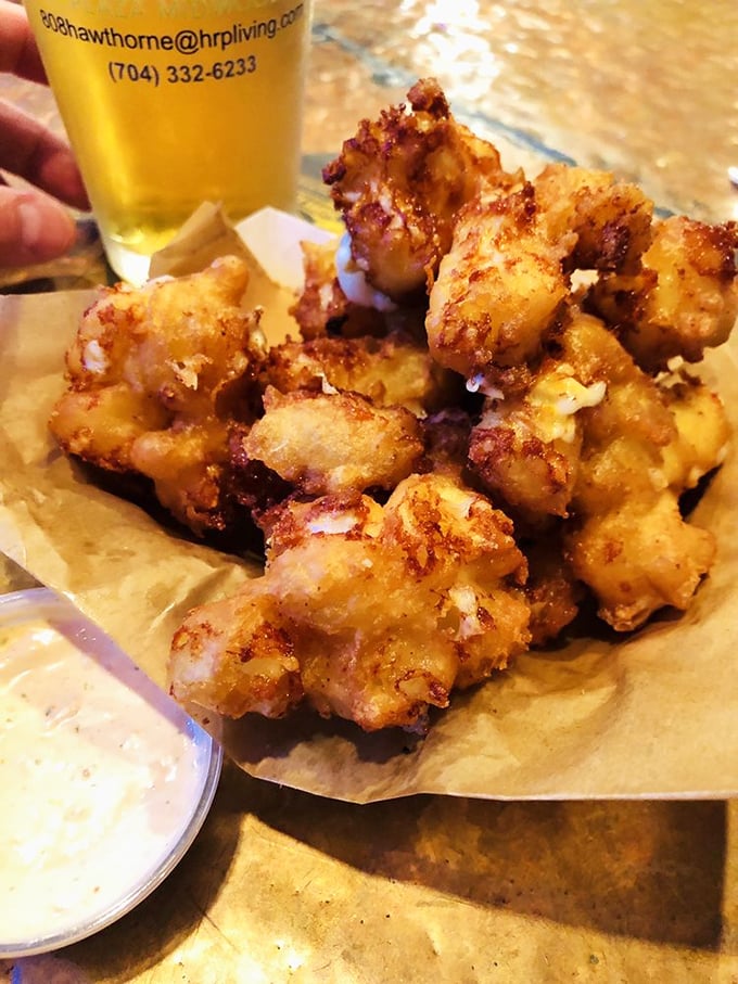 Golden-fried cheese curds that squeak with Wisconsin pride but speak with a Southern accent—the perfect beer companion.