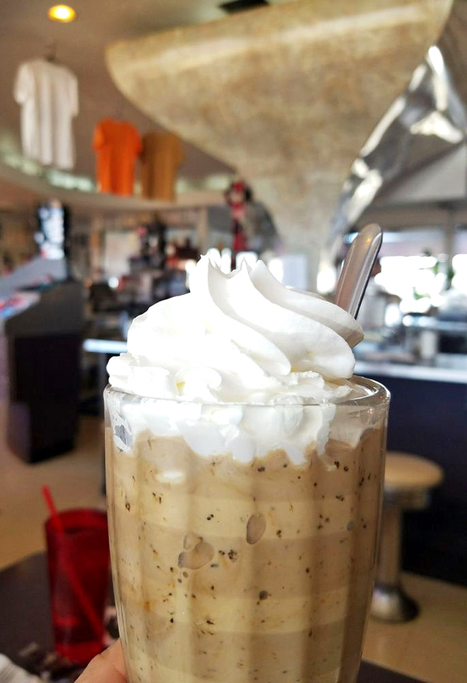 This isn't just a milkshake – it's a cloud-topped masterpiece that demands both a spoon and straw.