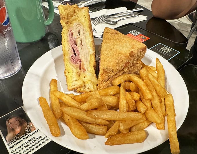 A Monte Cristo sandwich that's been properly battered and fried – the kind of guilty pleasure that makes you temporarily forget words like "cholesterol" exist.