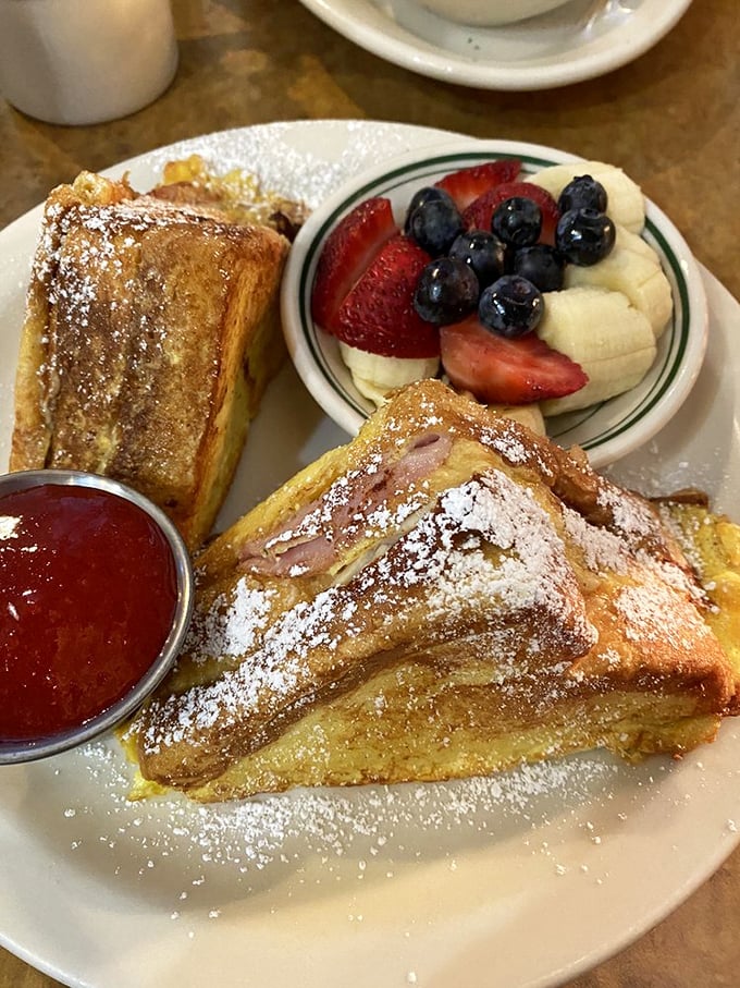 Monte Cristo that's dressed up for the occasion. The fruit cup isn't just a garnish – it's there to convince you this is a balanced meal.
