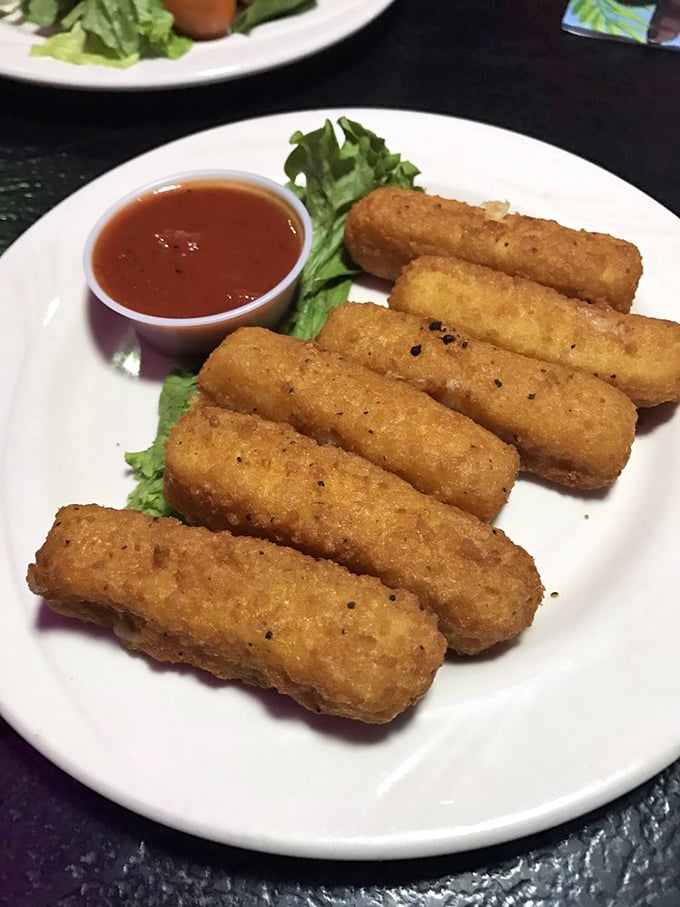 Golden-fried mozzarella sticks – because sometimes, even in Sin City, the most satisfying indulgence is simply melted cheese you can dip.