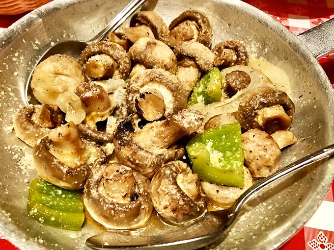These sizzling mushrooms aren't just a side dish – they're the opening act that deserves a standing ovation. Buttery, garlicky perfection that might upstage even the steaks.