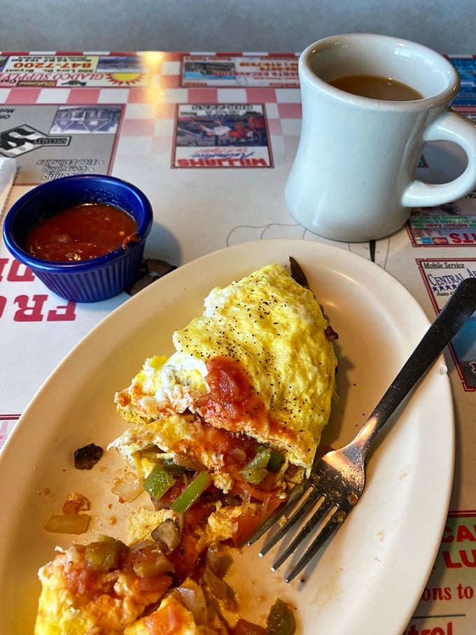 This Western omelet doesn't just contain vegetables—it showcases them, proving that green peppers and tomatoes were put on earth for this very purpose.