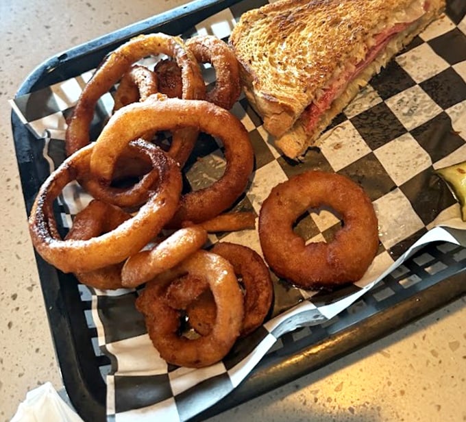 These onion rings aren't just fried—they're golden halos of crispy perfection that would make any astronaut homesick for Earth's simple pleasures.
