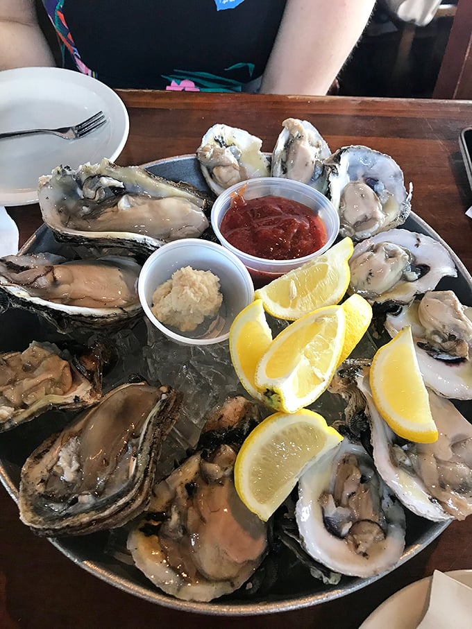 A platter of oysters on ice with all the fixings – nature's perfect appetizer and the ocean's most elegant calling card.