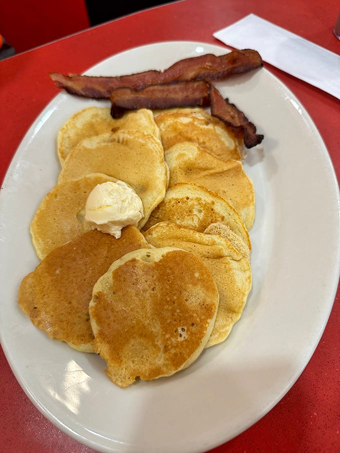 Pancakes so golden and fluffy they make you want to cancel all appointments for the day. Add that pat of butter and crispy bacon, and you've found breakfast nirvana.