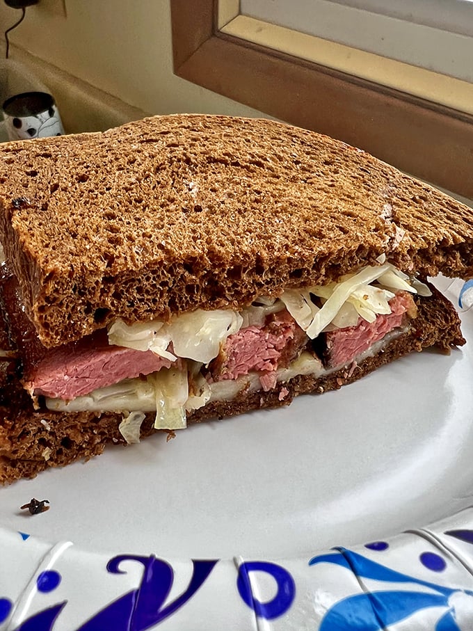 The Reuben gets a smoky makeover. House-smoked pastrami transforms this deli classic into something worth crossing state lines for.