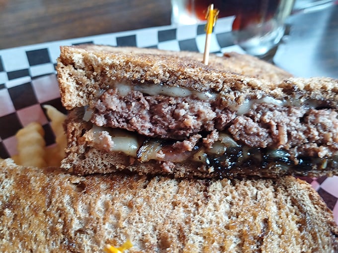 The patty melt at Fins performs the perfect dance between beef, melted cheese, and grilled bread—a sandwich that demands to be savored.