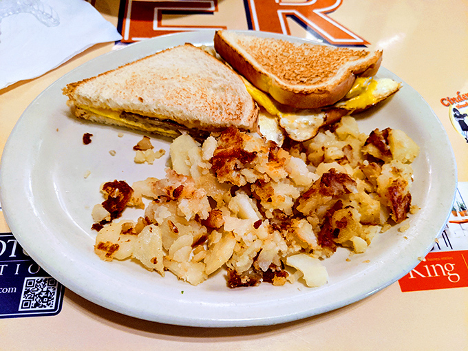 The breakfast sandwich and home fries – a dynamic duo more reliable than Batman and Robin, and significantly more satisfying after midnight.