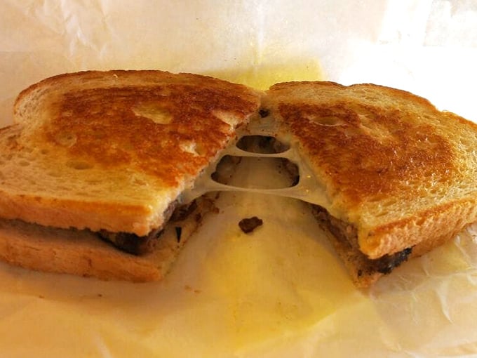 The humble patty melt – where bread meets beef in a marriage officiated by melted cheese and sealed with a kiss of butter.