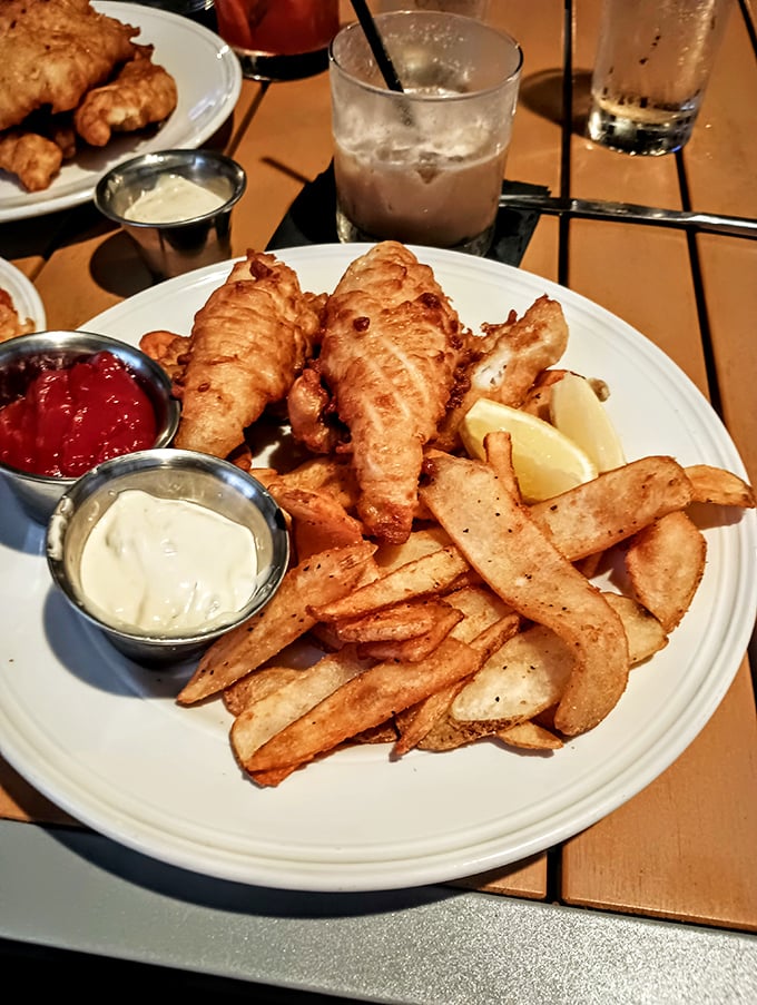 The perch dinner—where golden-battered fish meets hand-cut fries in a reunion that feels like summer at the lake, even in February.