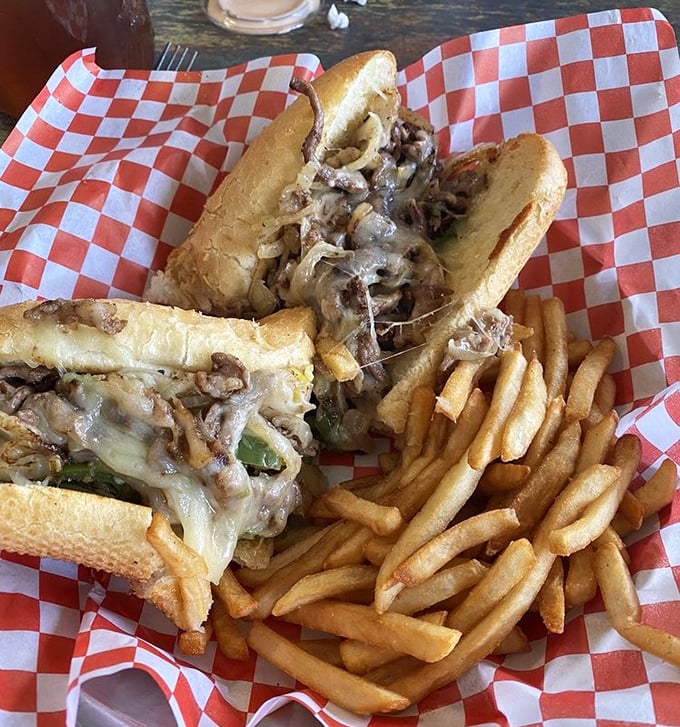 The Philly cheesesteak that dares to venture west – tender beef, melted cheese, and grilled onions creating that perfect sandwich harmony that transcends geography.