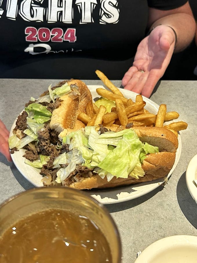 The Philly cheesesteak—a sandwich so serious about its mission to satisfy that it brings reinforcements in the form of crispy fries and fresh veggies.