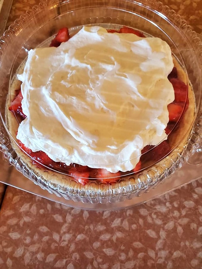 Strawberry pie with a cloud of whipped cream so perfect it should have its own Instagram account. Dessert as art form.