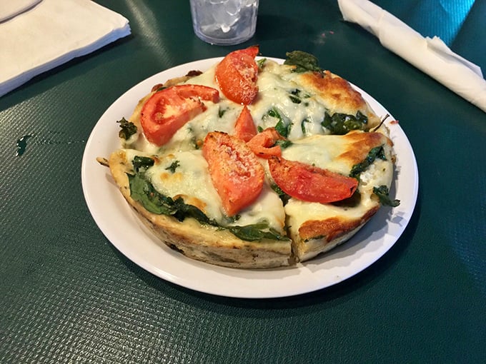The Pizza Villa Special showcases what happens when simple ingredients meet decades of pizza-making wisdom – a slice of DeKalb heritage.