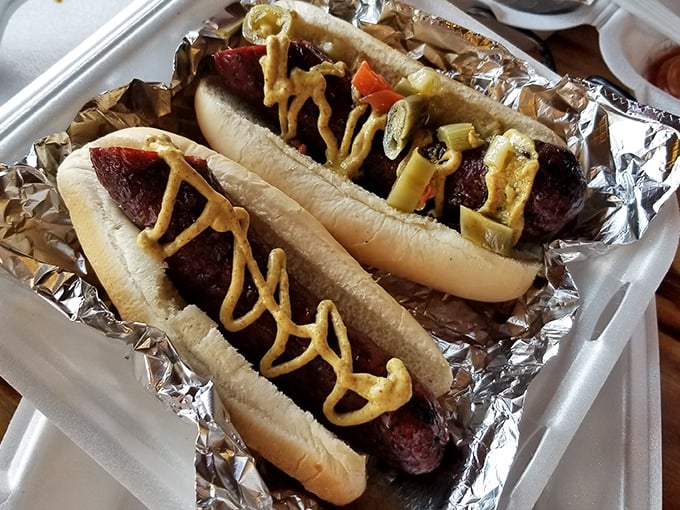 These sausages aren't just food—they're an event. Nestled in soft buns with that signature snap when you bite, they're simple perfection.