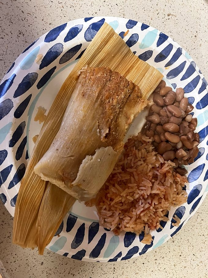 The perfect plate doesn't exi— Oh wait, here it is! A tamale with rice and beans is the comfort food trifecta that makes everything right with the world.