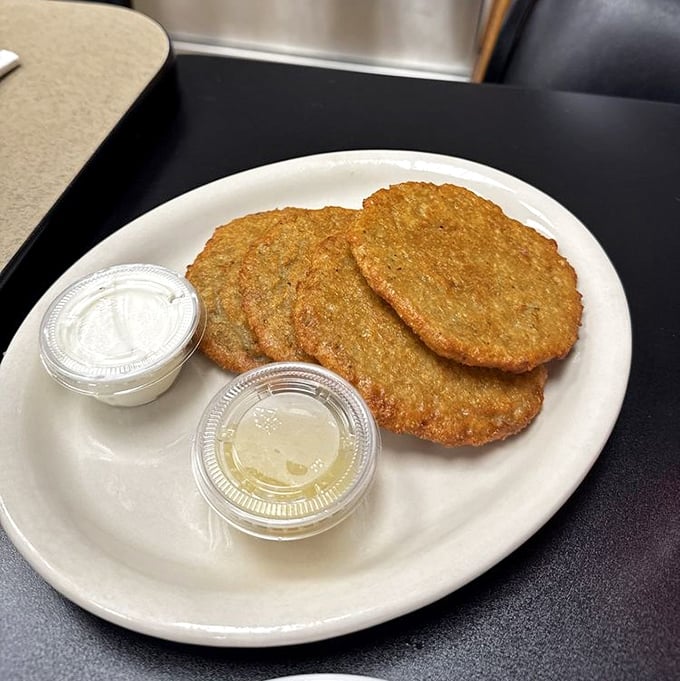 Golden potato pancakes with their crispy exterior and tender center—the kind grandmothers everywhere would approve of.